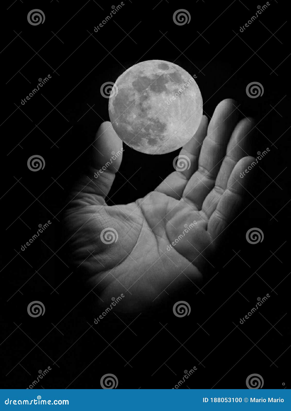 Moon between fingers stock photo. Image of effect, toro - 188053100