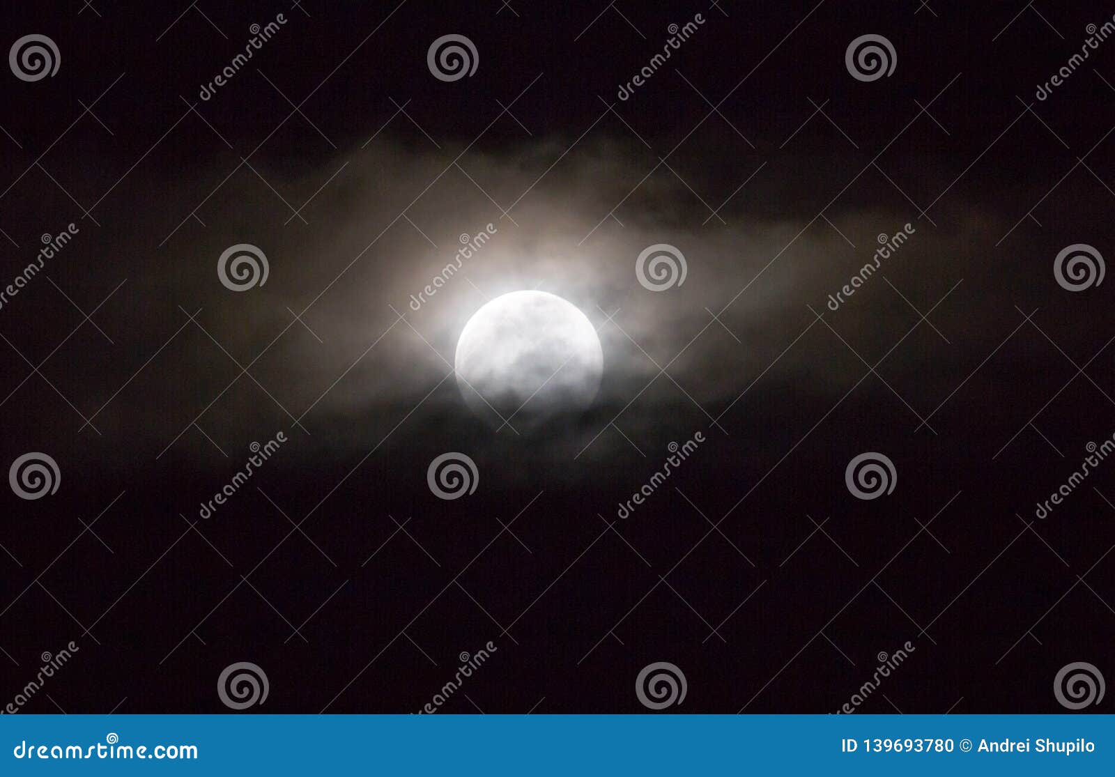 The Moon in the Haze of the Clouds at Night Stock Photo - Image of ...