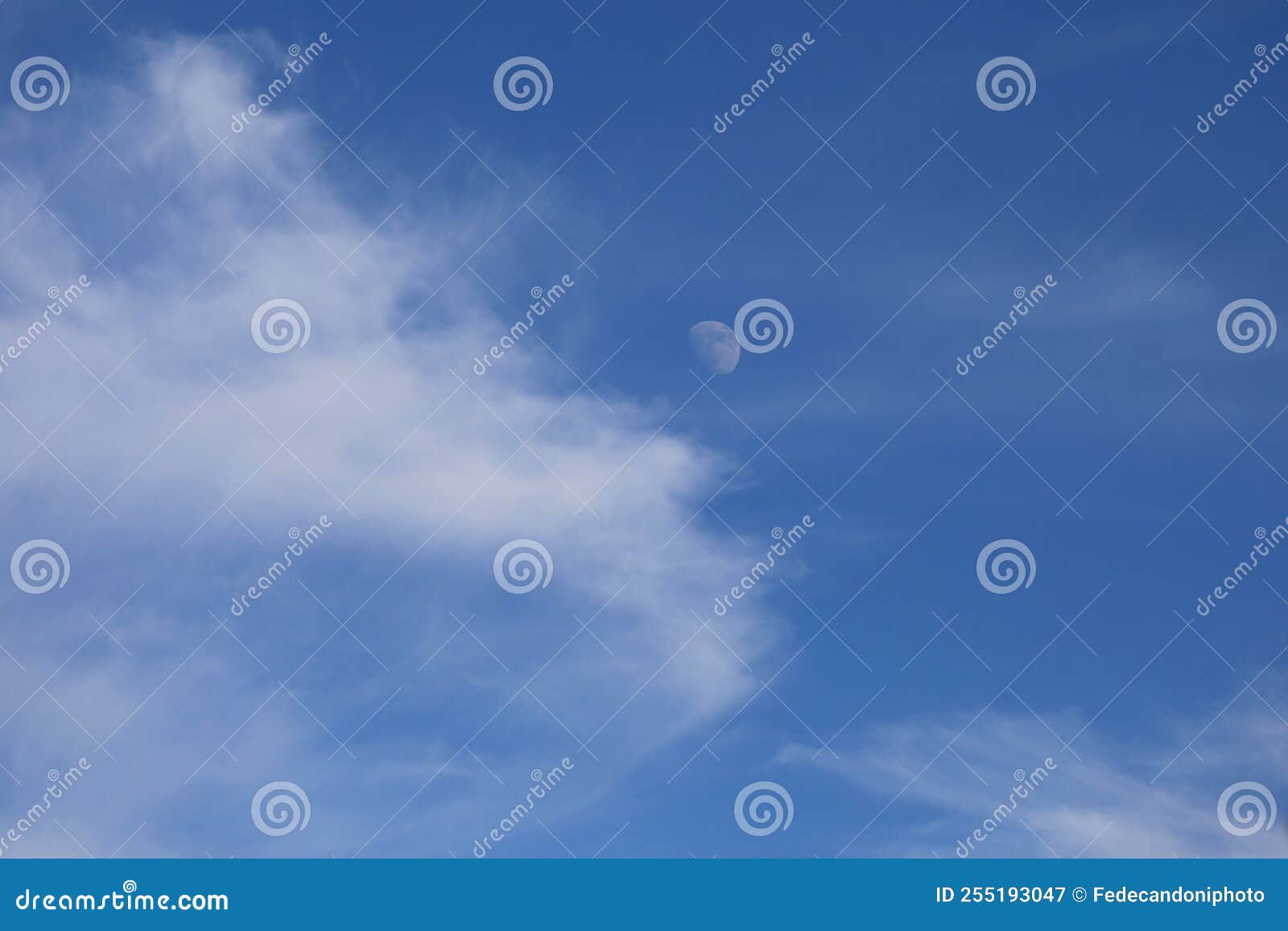 Moon Just Risen and Barely Visible during the Day in the Blue Sk Stock ...