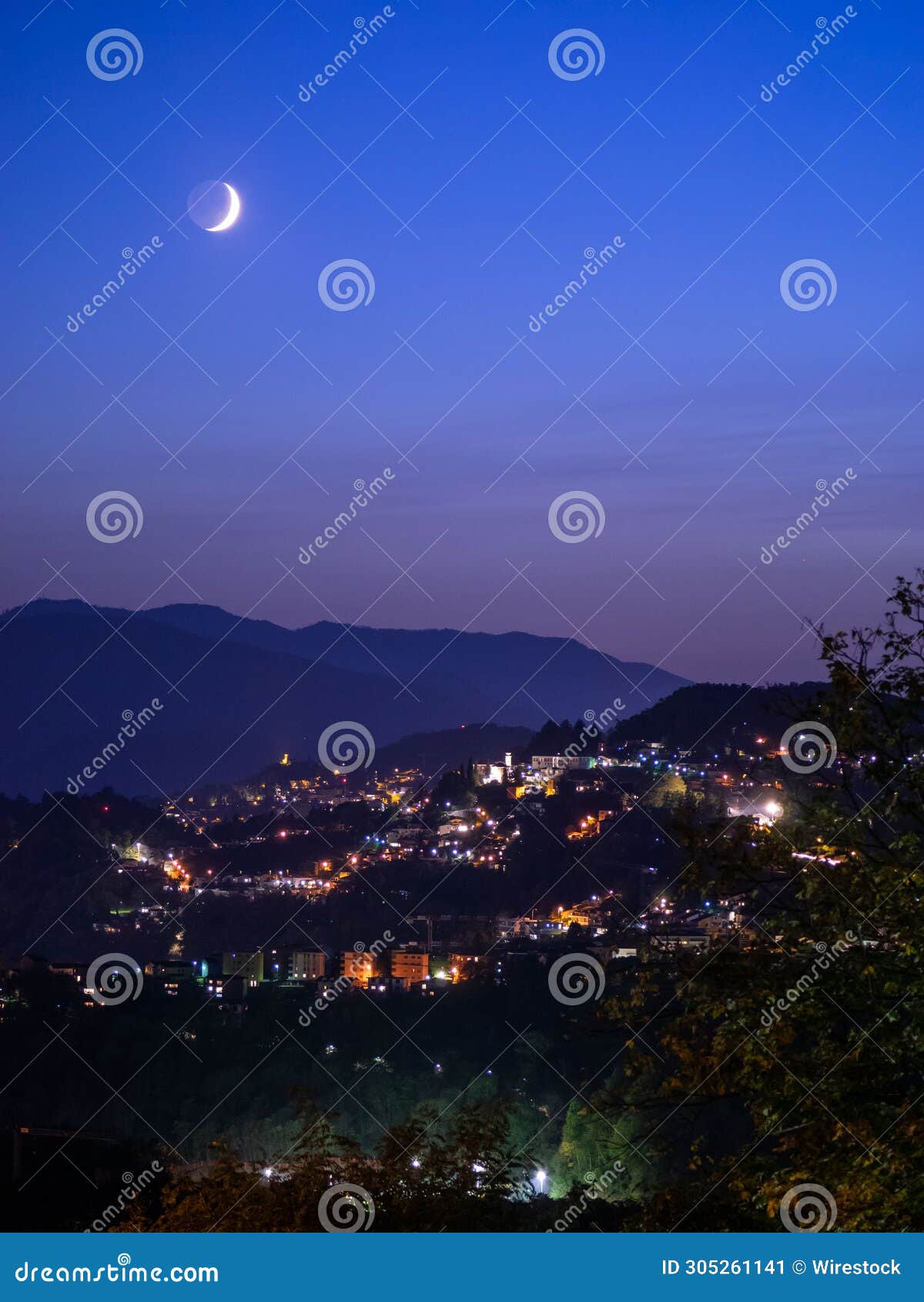 The Moon and the Night Sky Over the Town from the Hill Top Stock Image ...