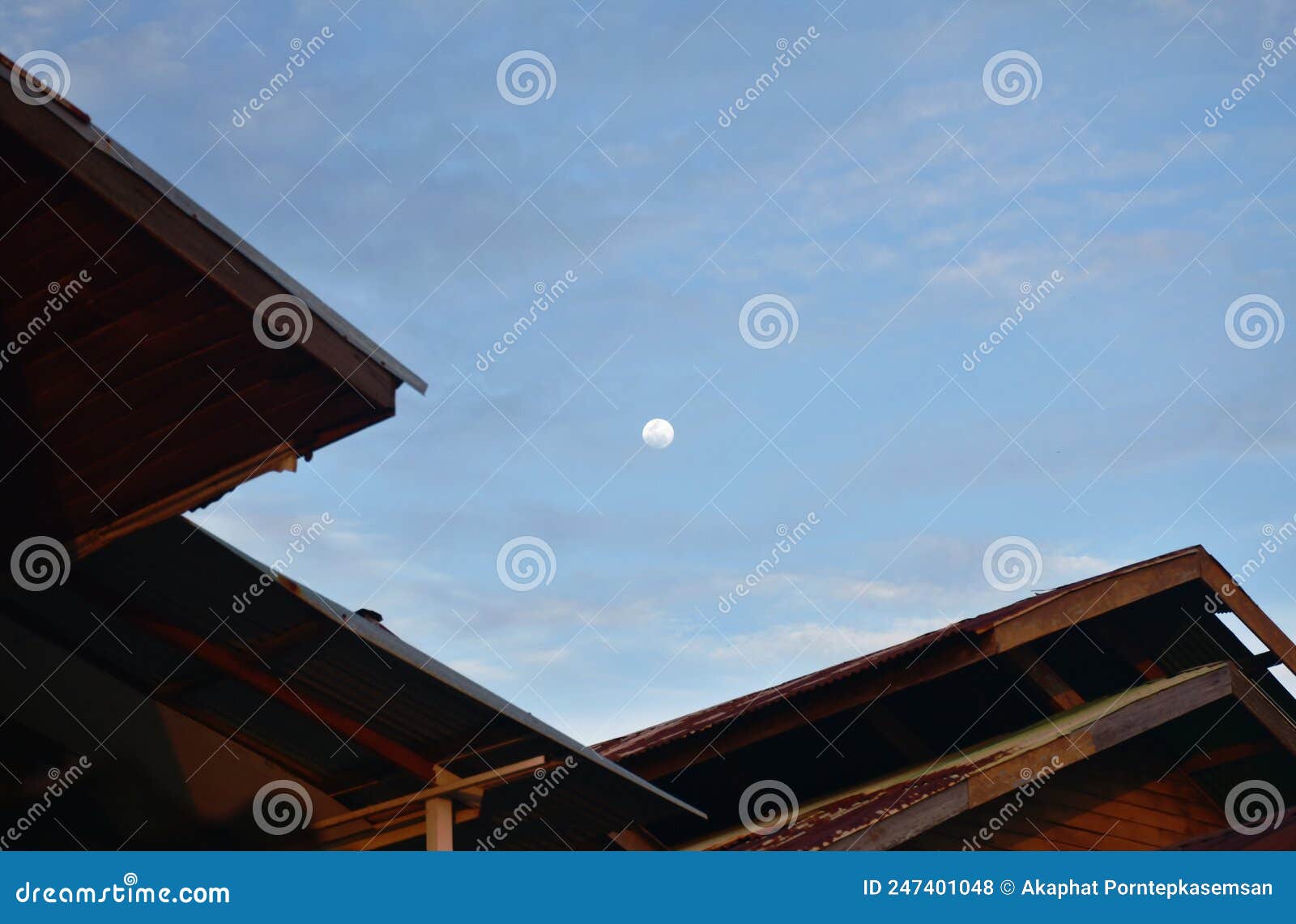Moon Over Home Rooftop in Sky on Evening Stock Photo - Image of evening ...