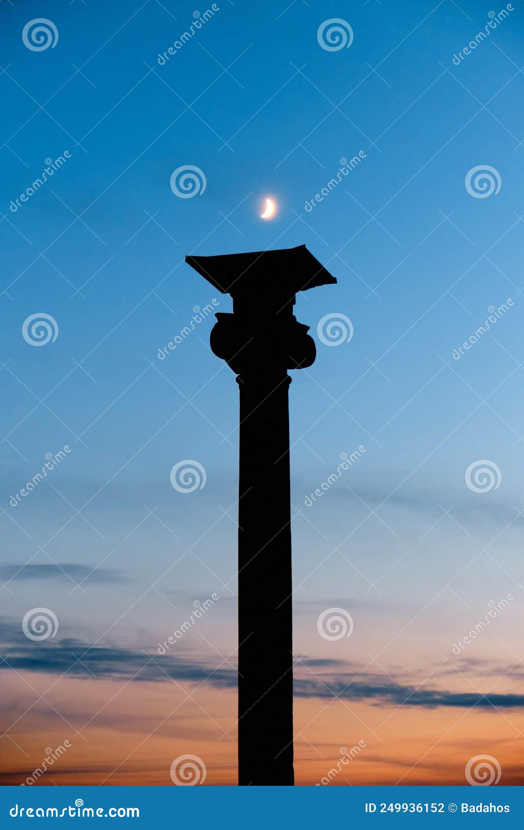 Moon and Pillar in the Sunset Sky Stock Photo - Image of landmark, city ...