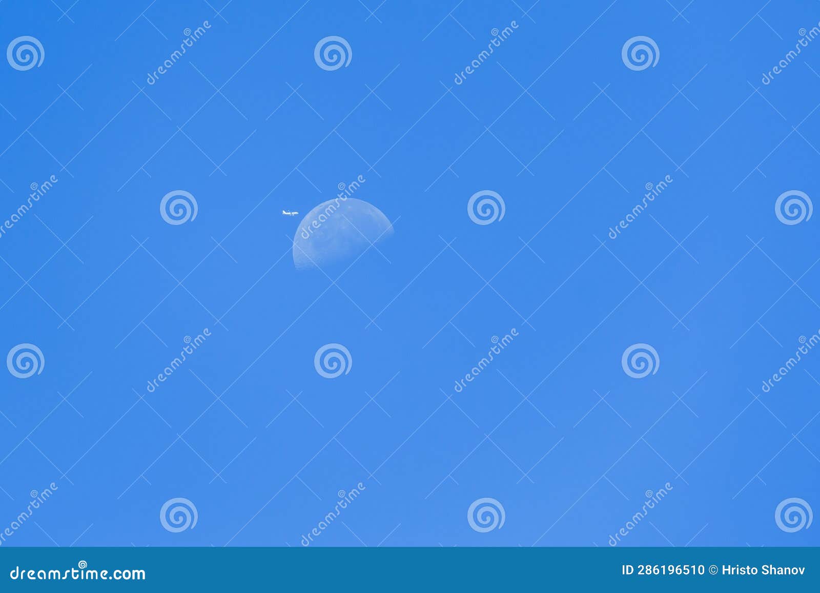 Daily Moon with Plane in the Blue Sky Stock Photo - Image of crater ...
