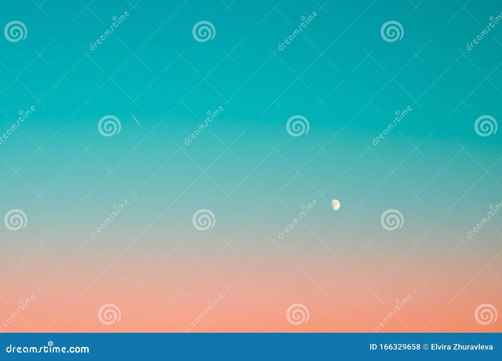 The Moon and a Plane in the Clear Duotone Gradient Blue Evening Sky ...