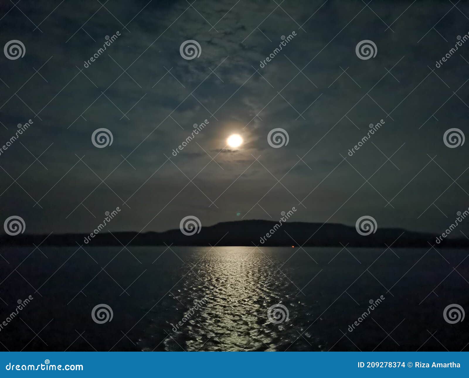 Moon Reflection Above the Sea Stock Photo - Image of nature, clouds ...