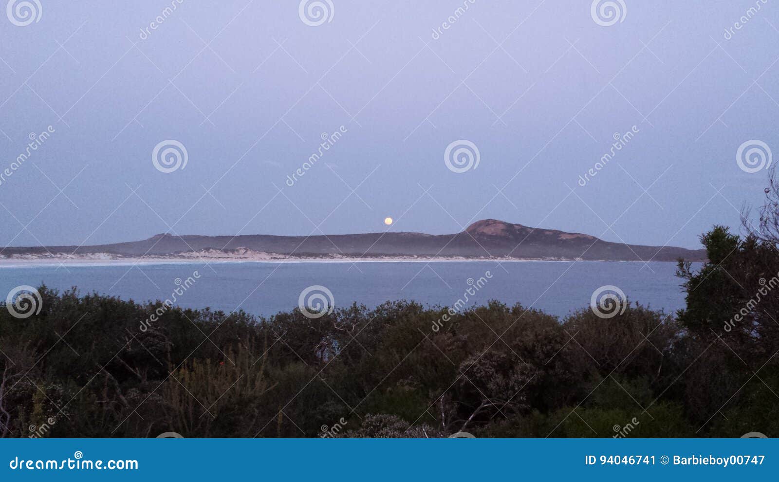 Moon Reflection Over Water Above a Mountain Range Stock Image - Image ...