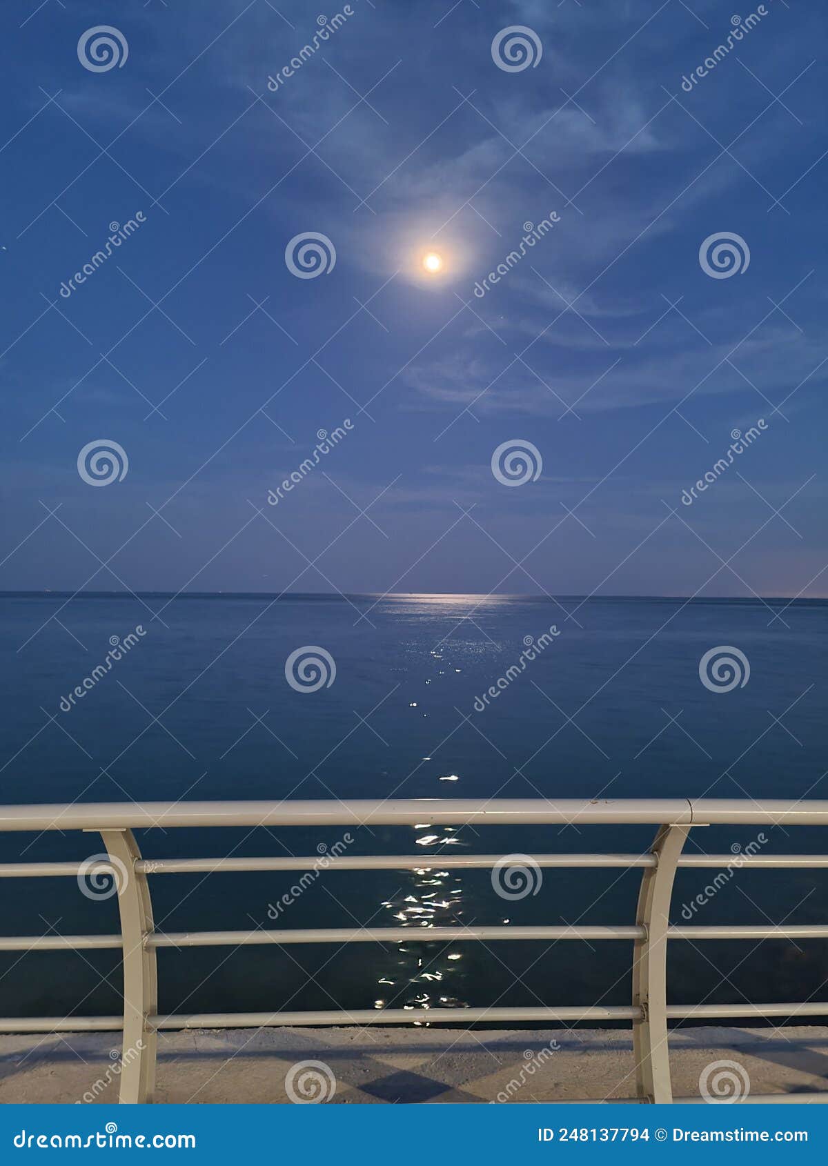 Moon rise from the sea stock photo. Image of line, glass - 248137794