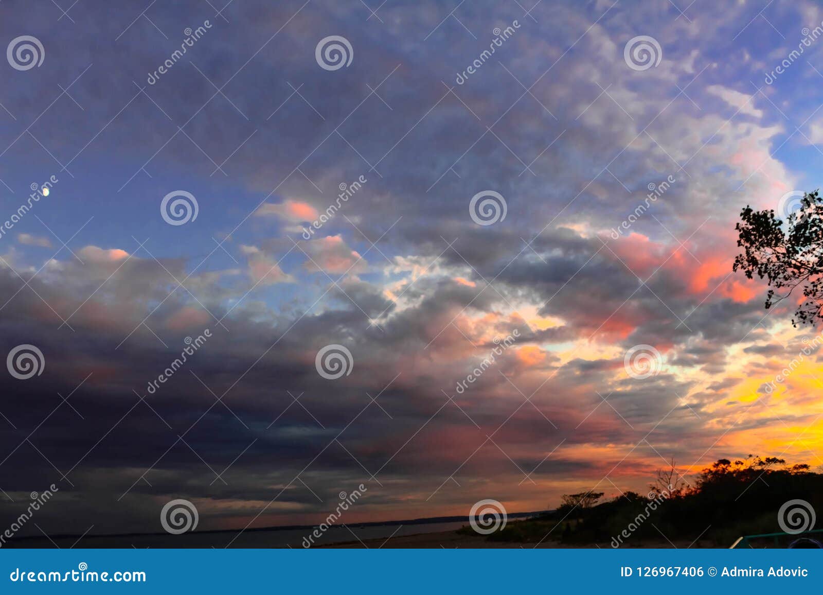 Moon and Sunset after a Rain Storm Stock Photo - Image of super, white ...