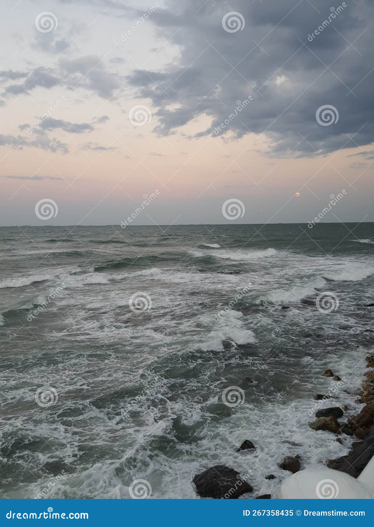 The moon among the waves stock image. Image of green - 267358435