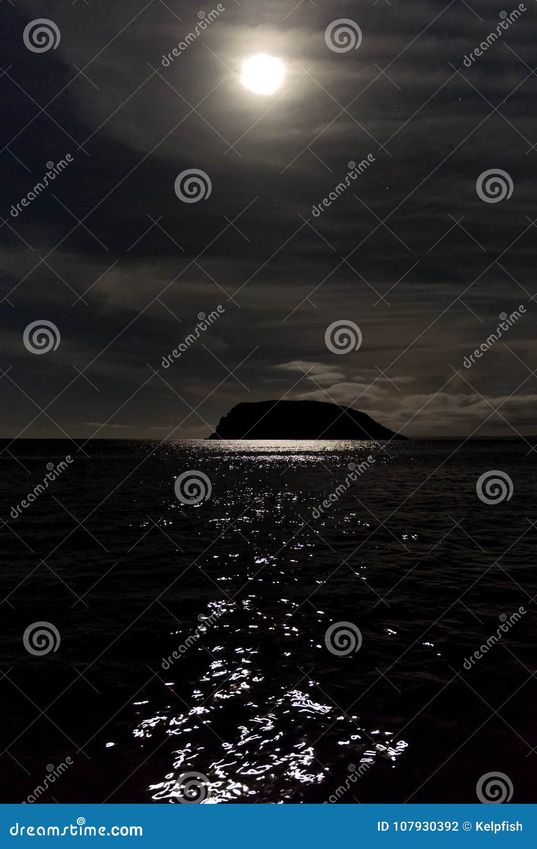 Moonlight over ocean stock photo. Image of reflection - 107930392