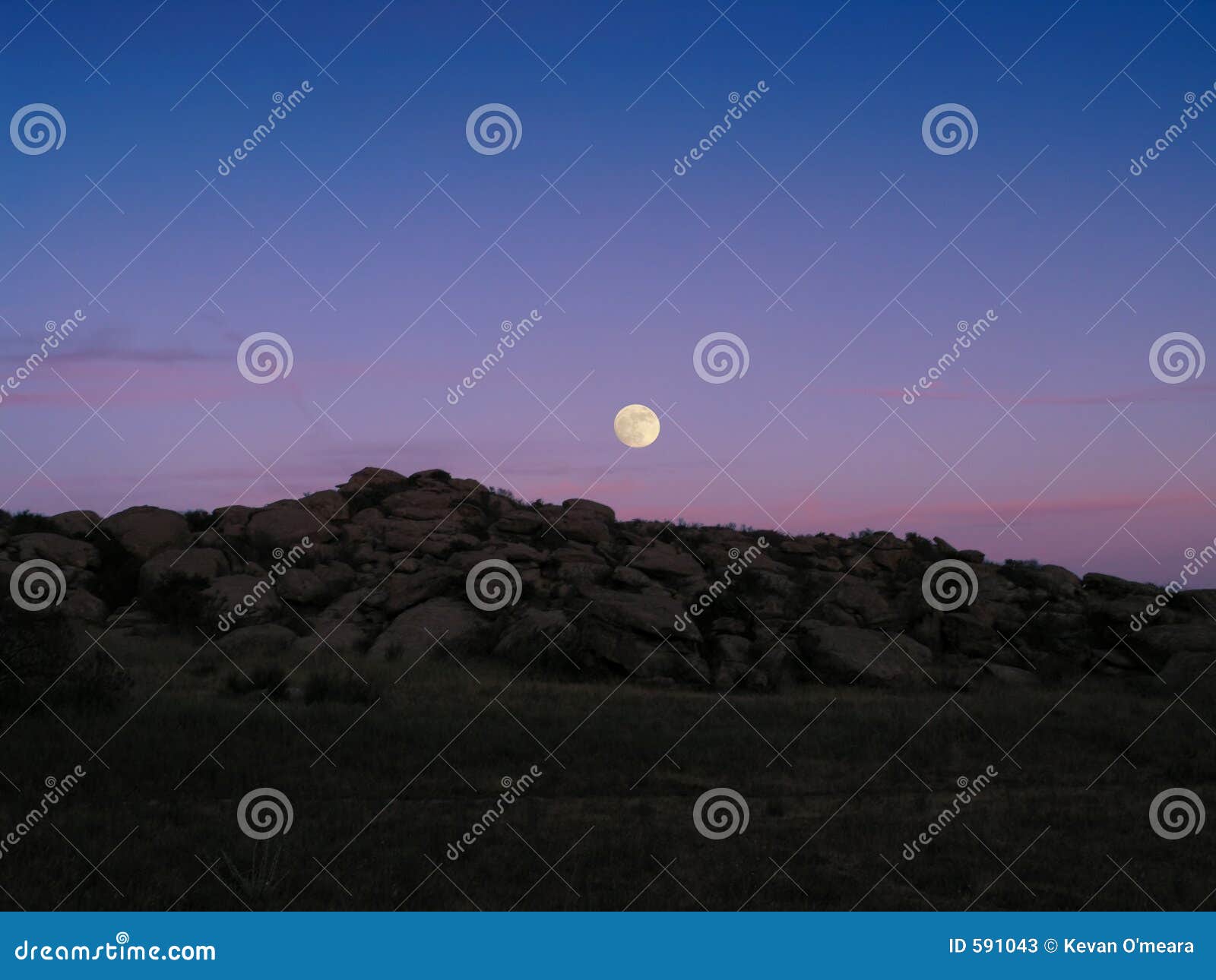 Moonrise over rocks stock image. Image of moonrise, rock - 591043