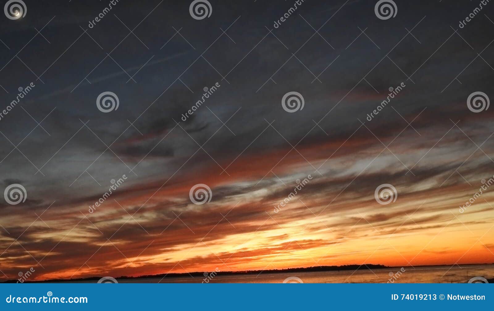 Moonrise Sunset: Dance of the Sun and Moon Stock Image - Image of ...