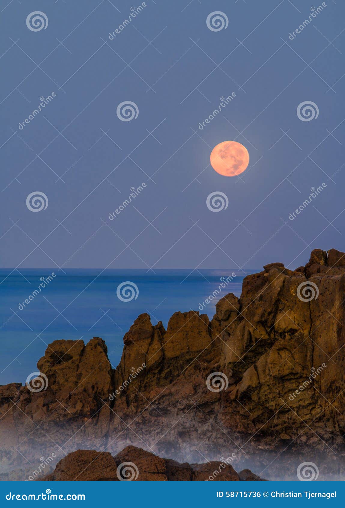 Moonset over Laguna Beach stock photo. Image of dusk - 58715736