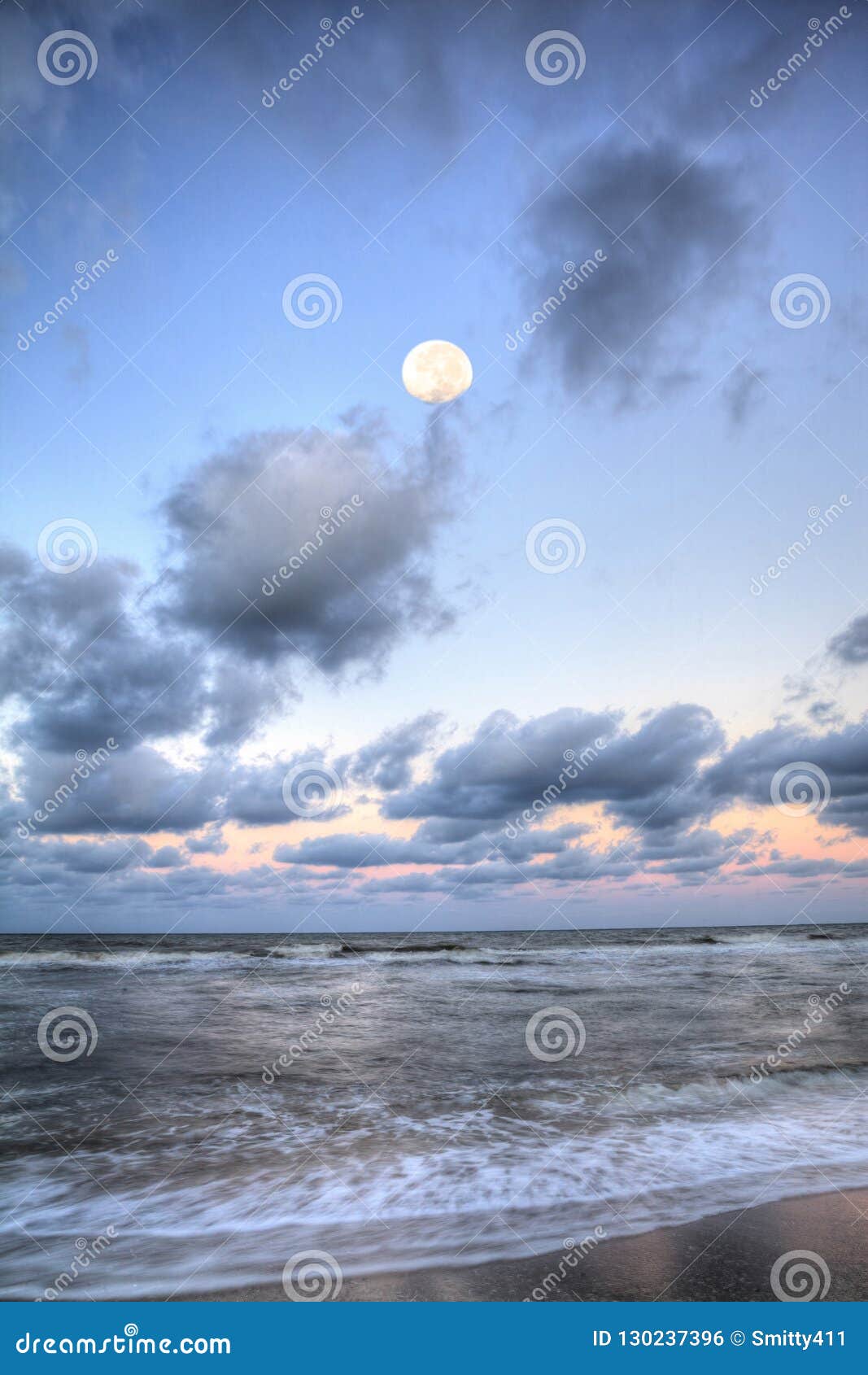Moonset Over the Ocean at Vanderbilt Beach at Sunset Stock Photo ...