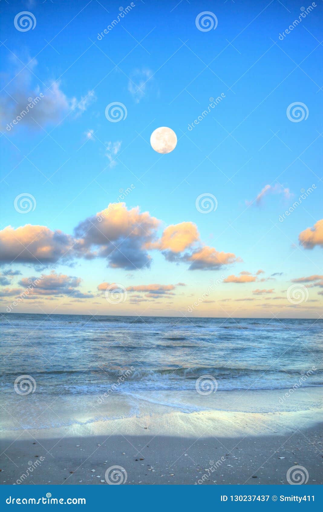 Moonset Over the Ocean at Vanderbilt Beach at Sunset Stock Image ...