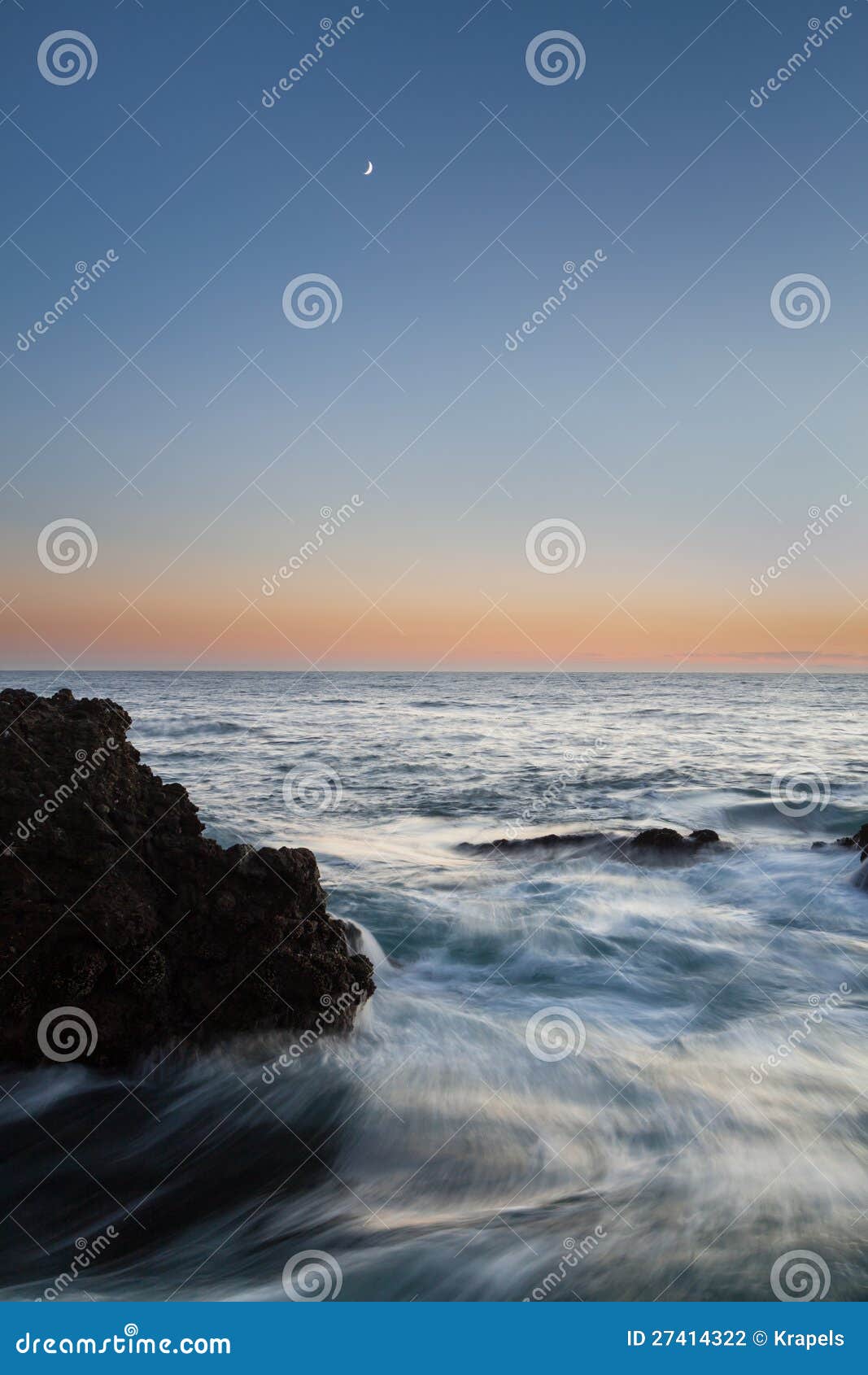 Moonset over rocky ocean stock photo. Image of beach - 27414322