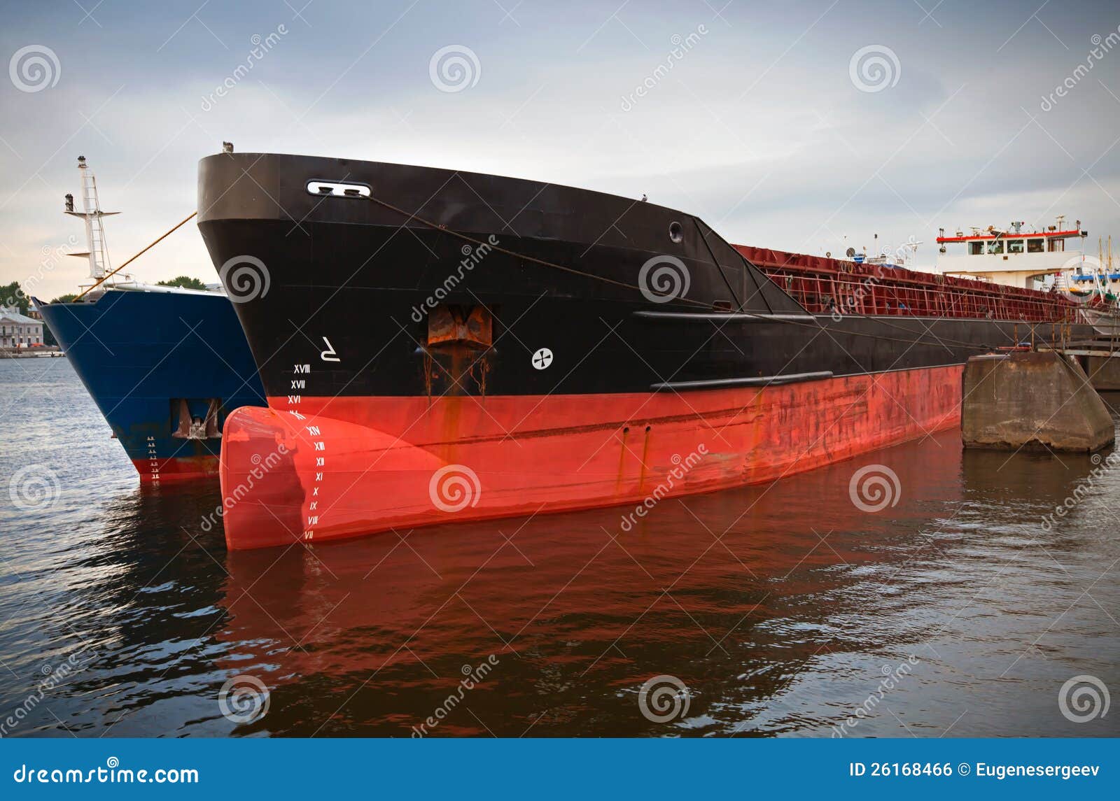 Moored trader ships stock photo. Image of afloat, reflection - 26168466