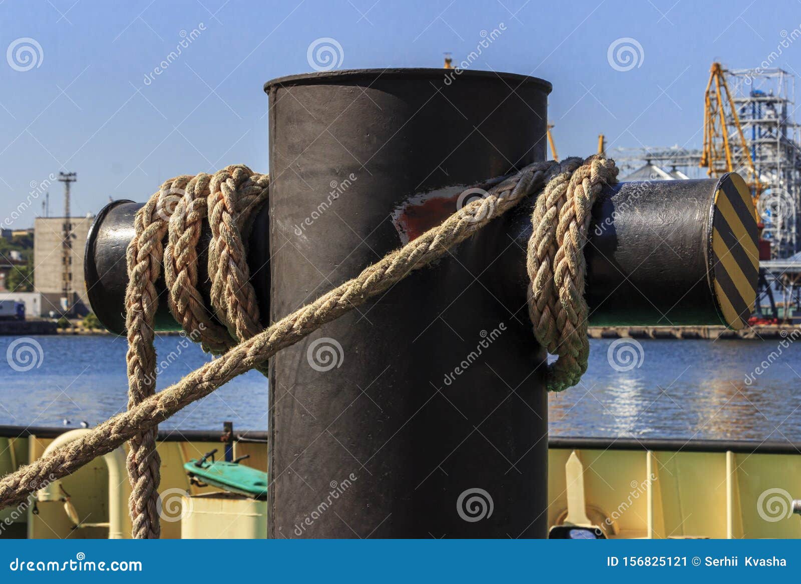Mooring bollard with ropes stock image. Image of closeup - 156825121