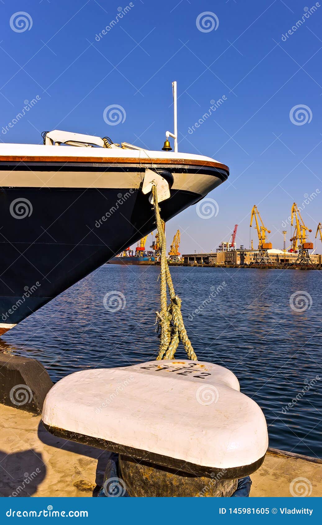 Mooring Bollard on the Wharf with Hawser of Ship Bollard by the Shore ...