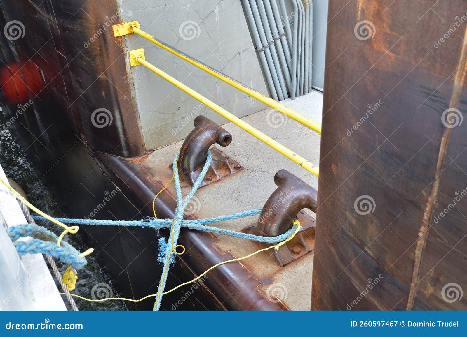 Mooring Bollards with Large Diameter Blue Ropes Stock Image - Image of ...