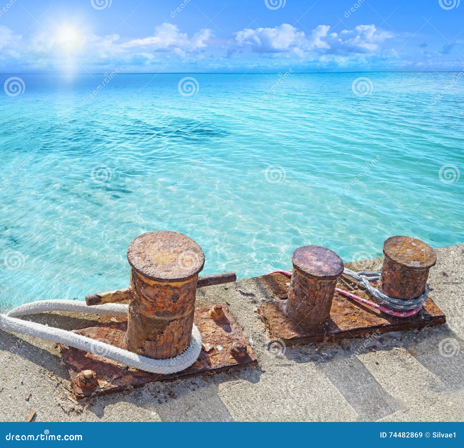 Mooring Bollards with Ship Ropes. Stock Image - Image of dominican ...