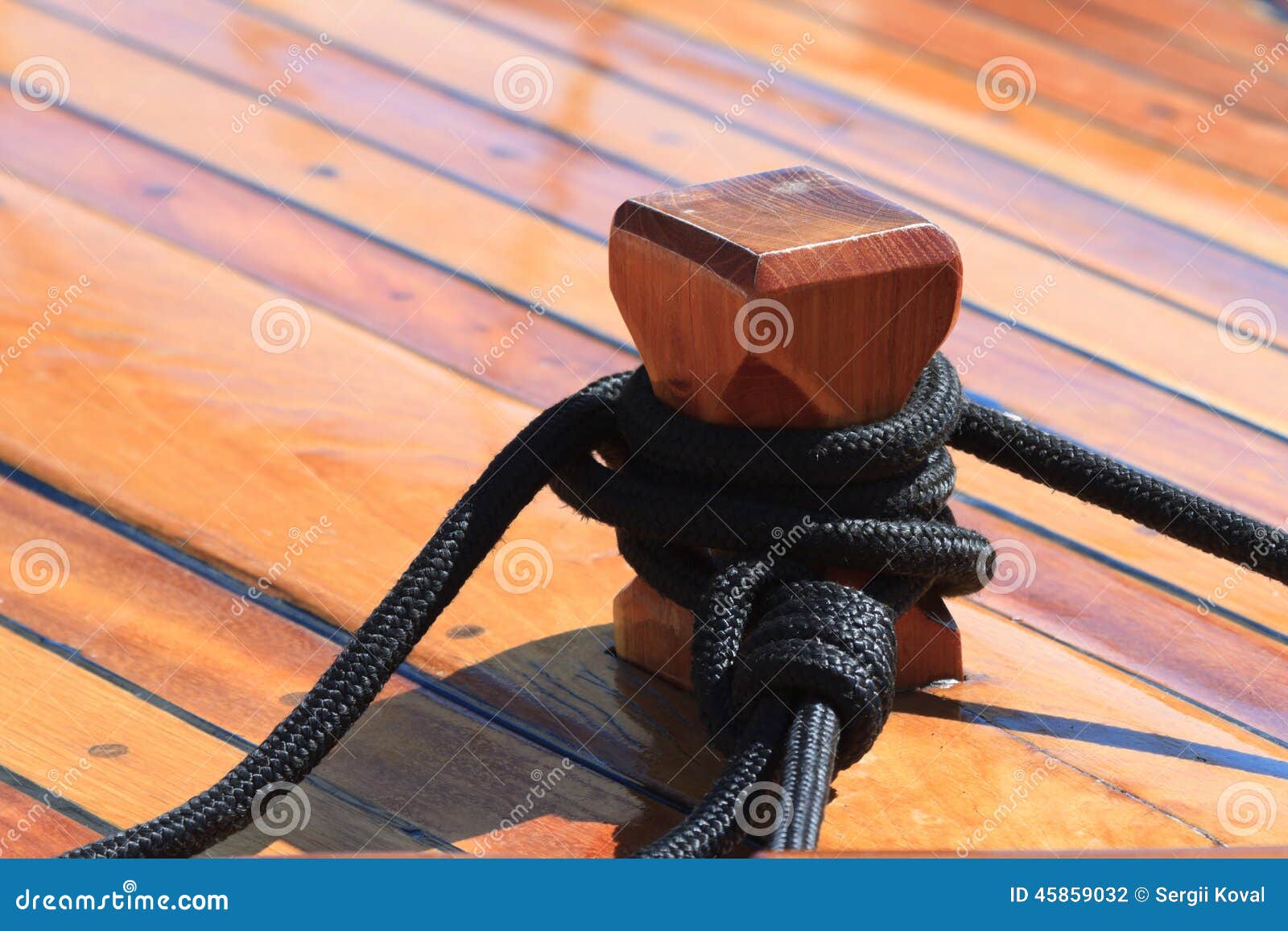 Mooring Node Closeup on Wooden Deck of a Yacht Stock Photo - Image of ...