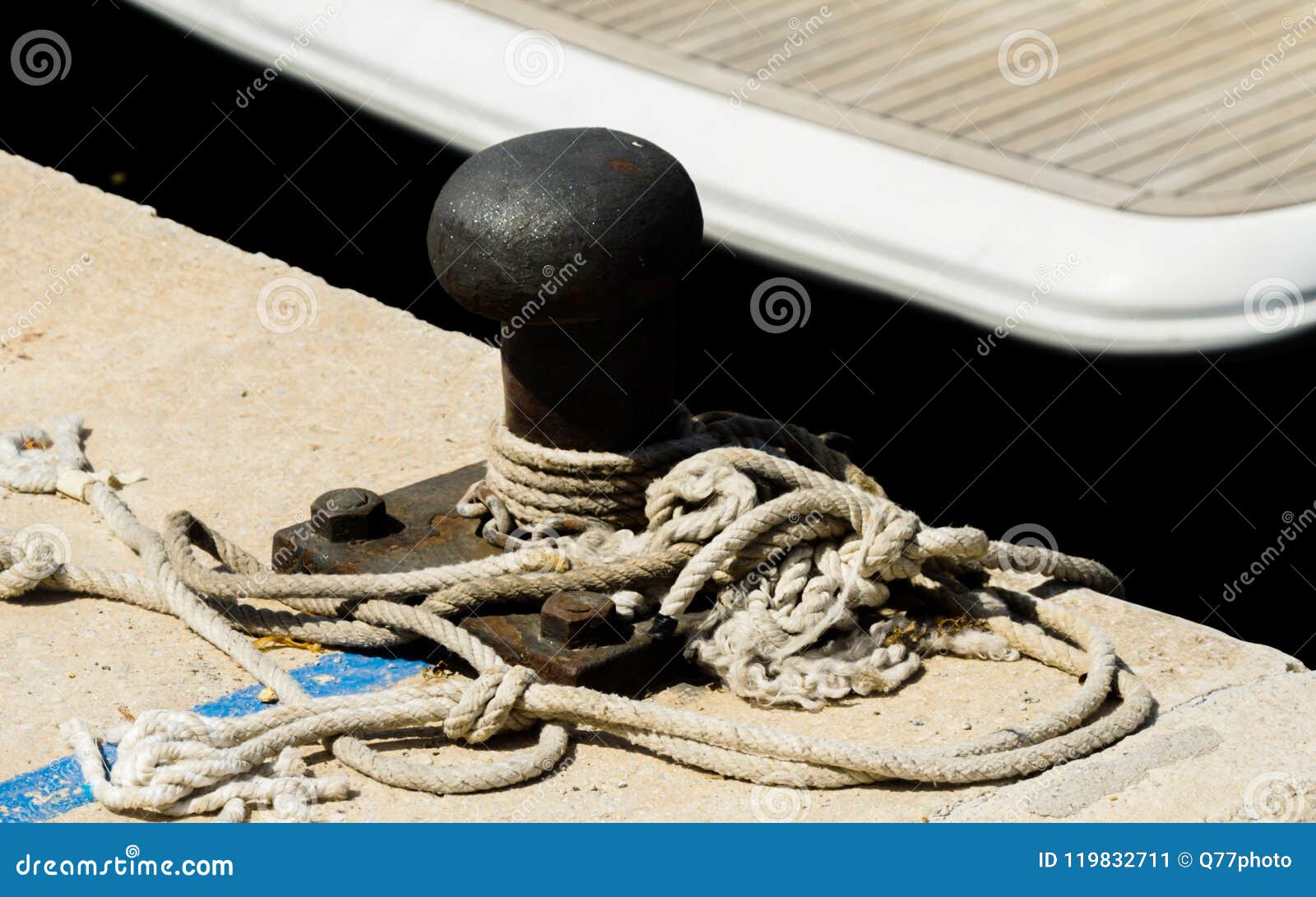 Mooring Post on the Waterfront in a Small Marina, Element for Mo Stock ...