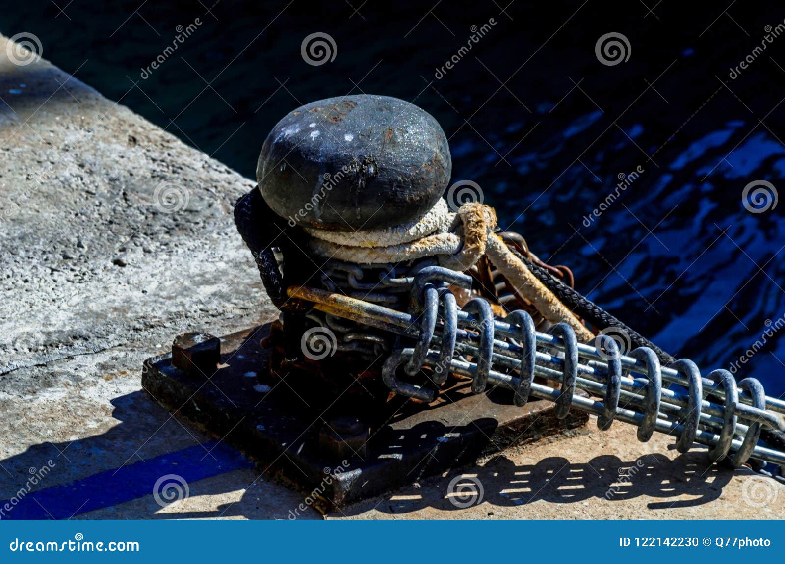 Mooring Post on the Waterfront in a Small Marina, Element for Mo Stock ...