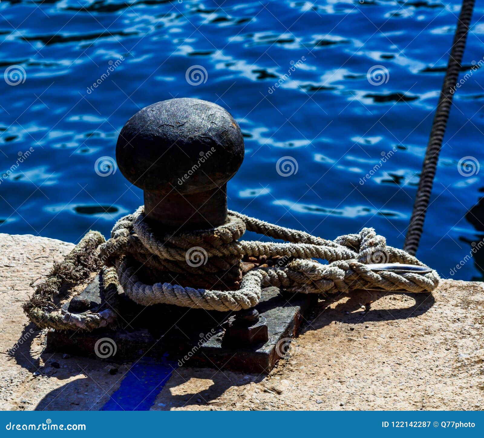 Mooring Post on the Waterfront in a Small Marina, Element for Mo Stock ...