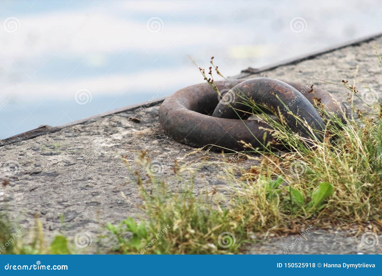 Mooring Ring With Rope Tied On It. Close Up Image With A Solid Iron ...