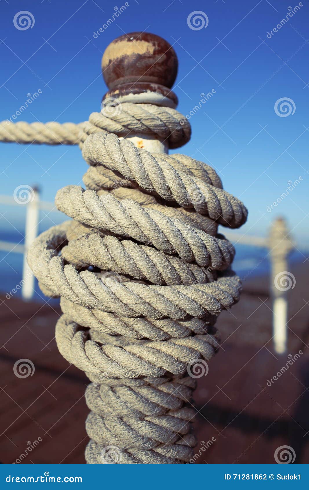 Mooring Rope Tied To a Bollard on the Dock Stock Photo - Image of ...