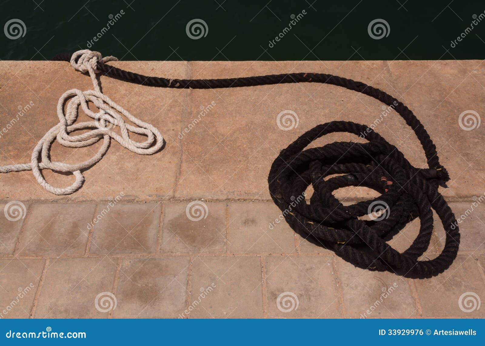 Mooring ropes on jetty stock photo. Image of boat, fiber - 33929976