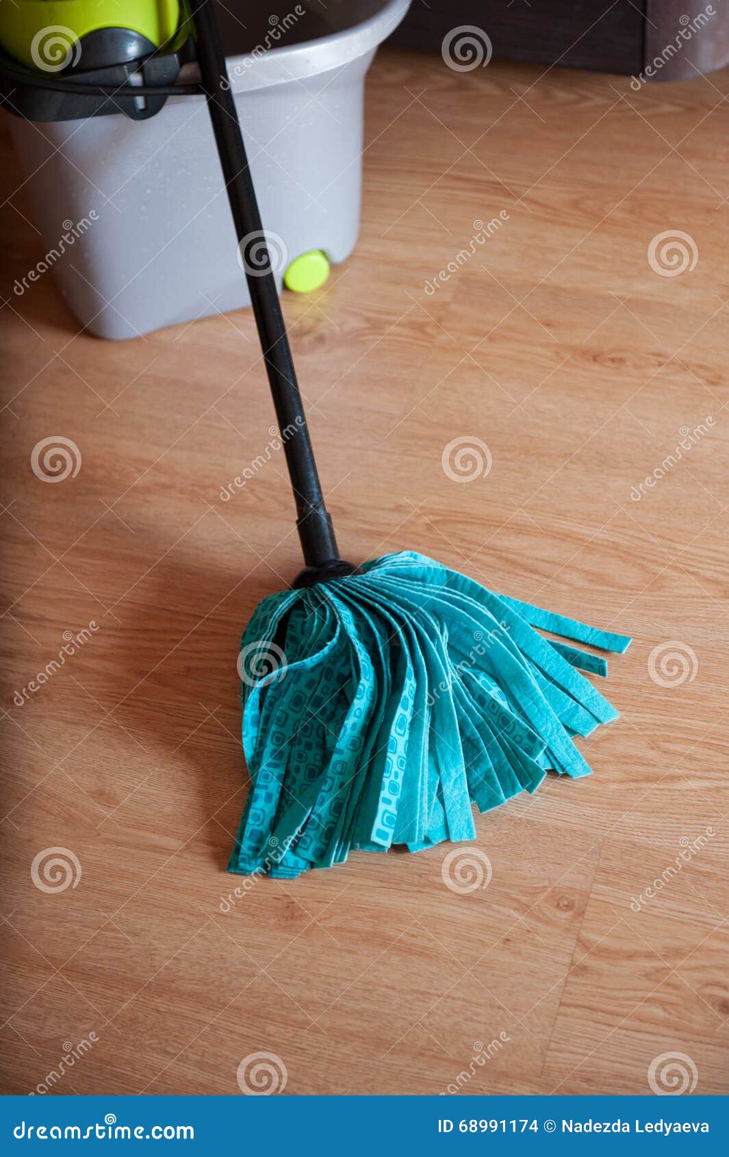 Mop with a bucket stock photo. Image of household, interior - 68991174