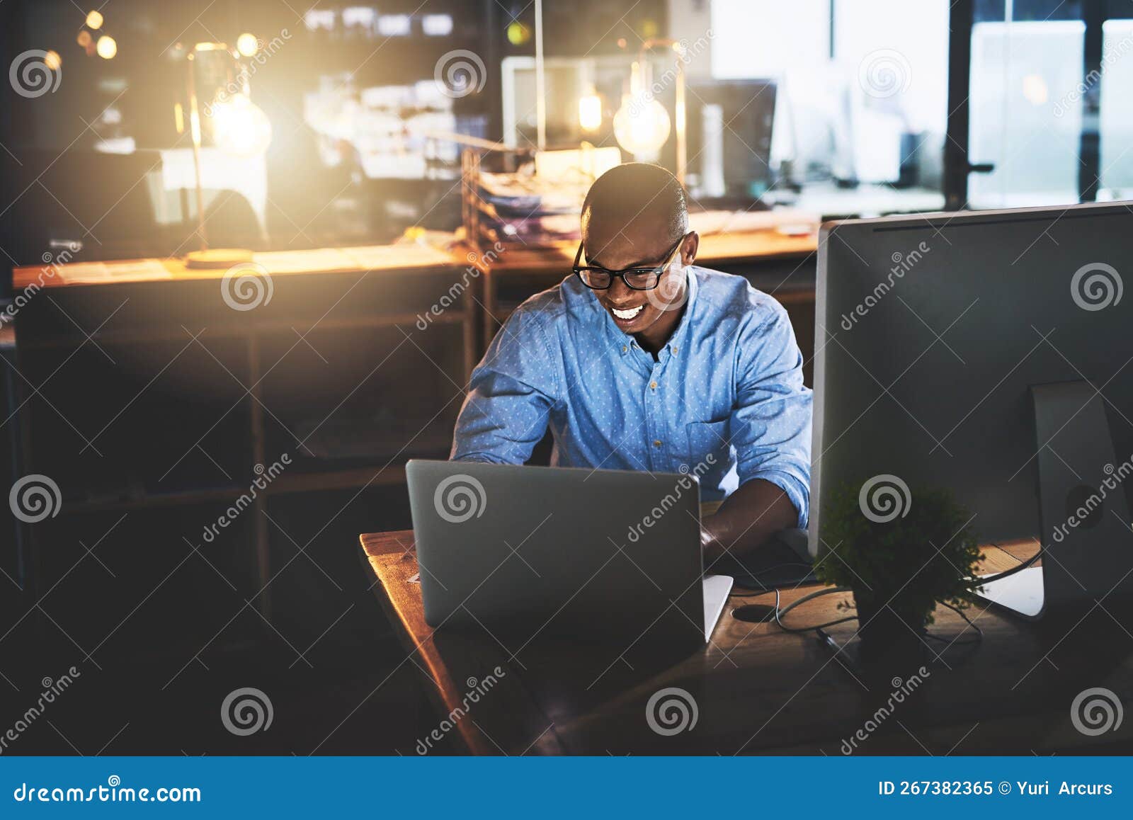More Computers, More Work, More Success. a Handsome Young Businessman ...