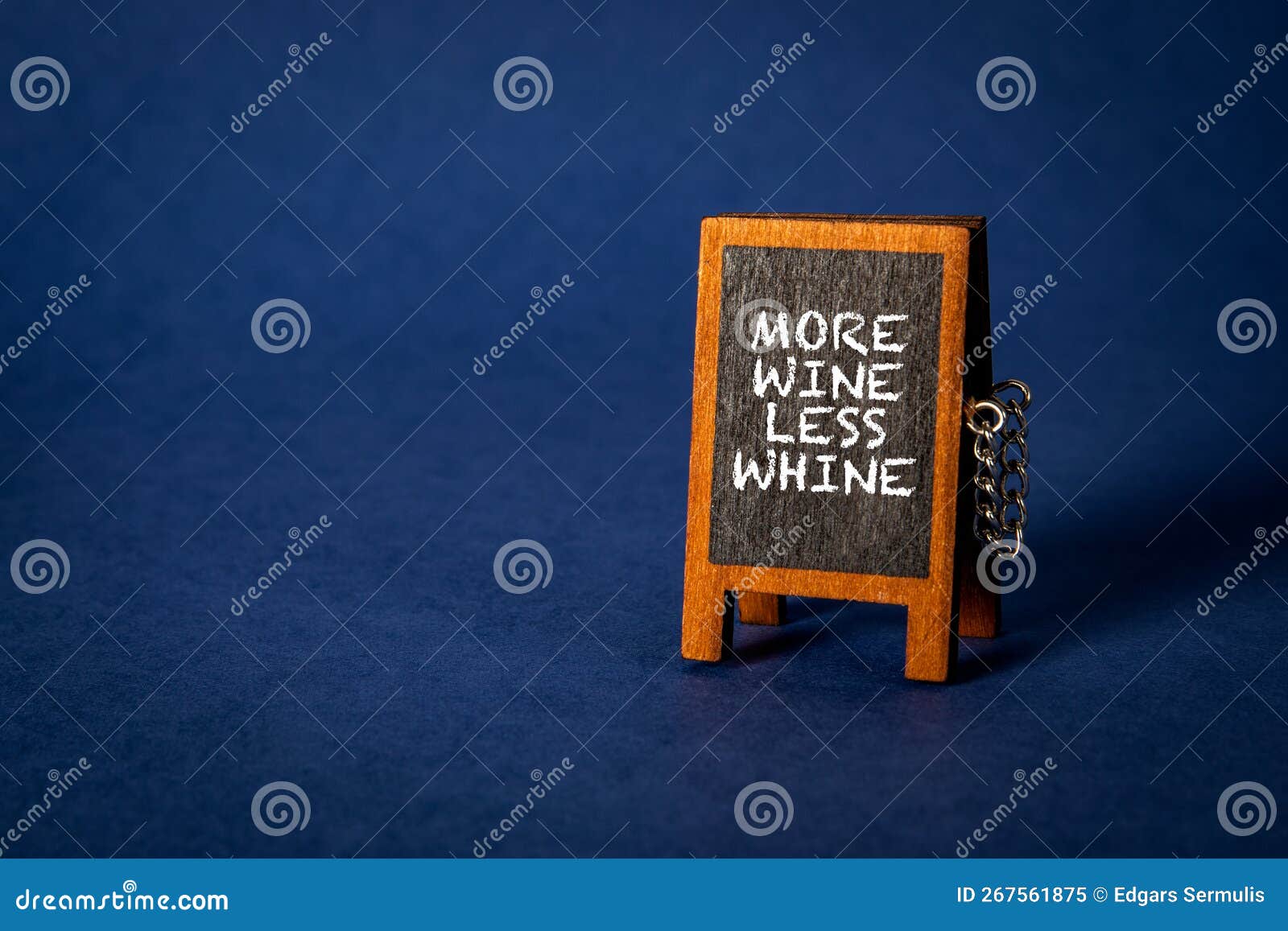 More Wine less Whine. Miniature Chalkboard on a Blue Background Stock ...