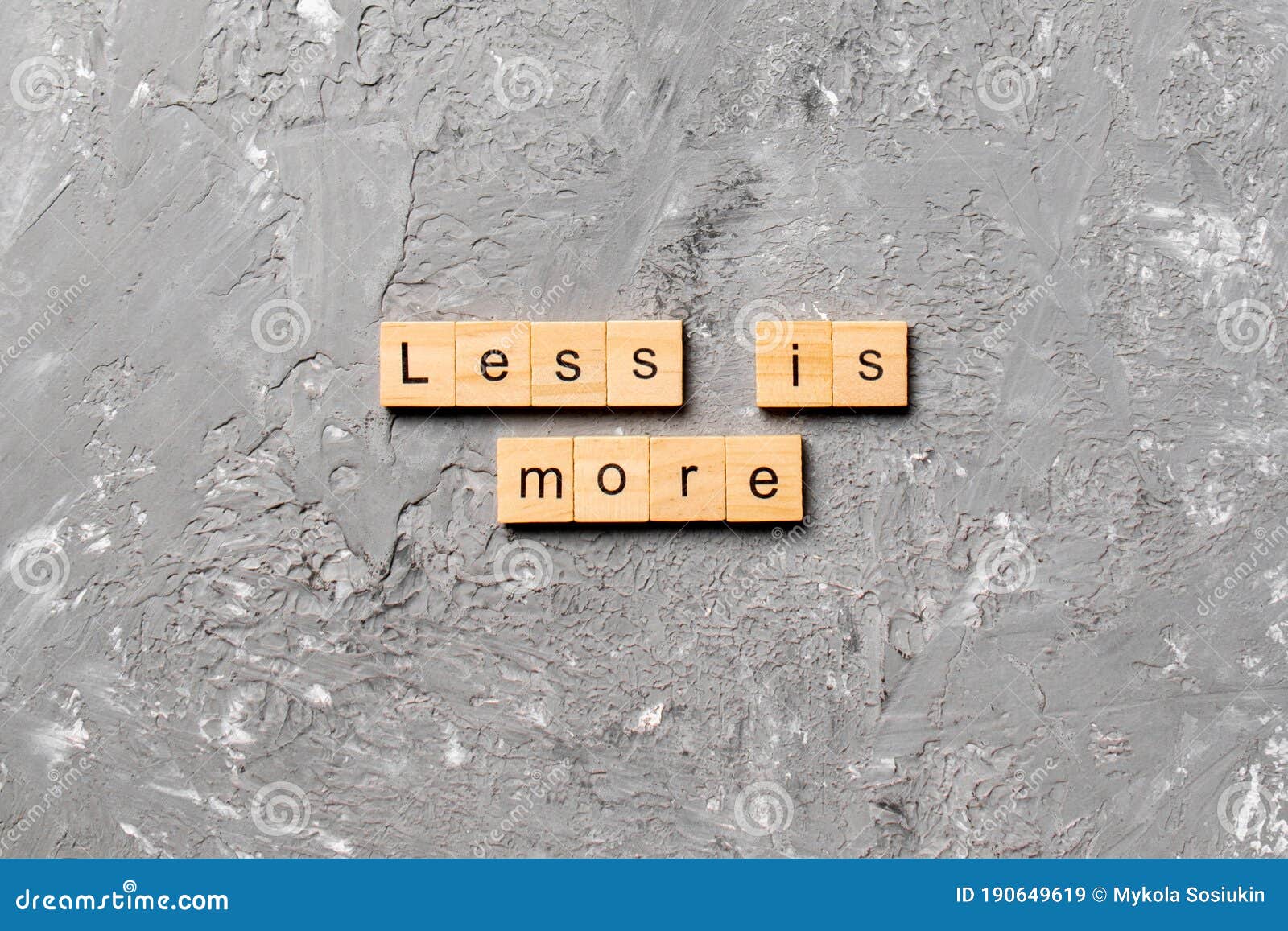 Less is More Word Written on Wood Block. less is More Text on Table ...