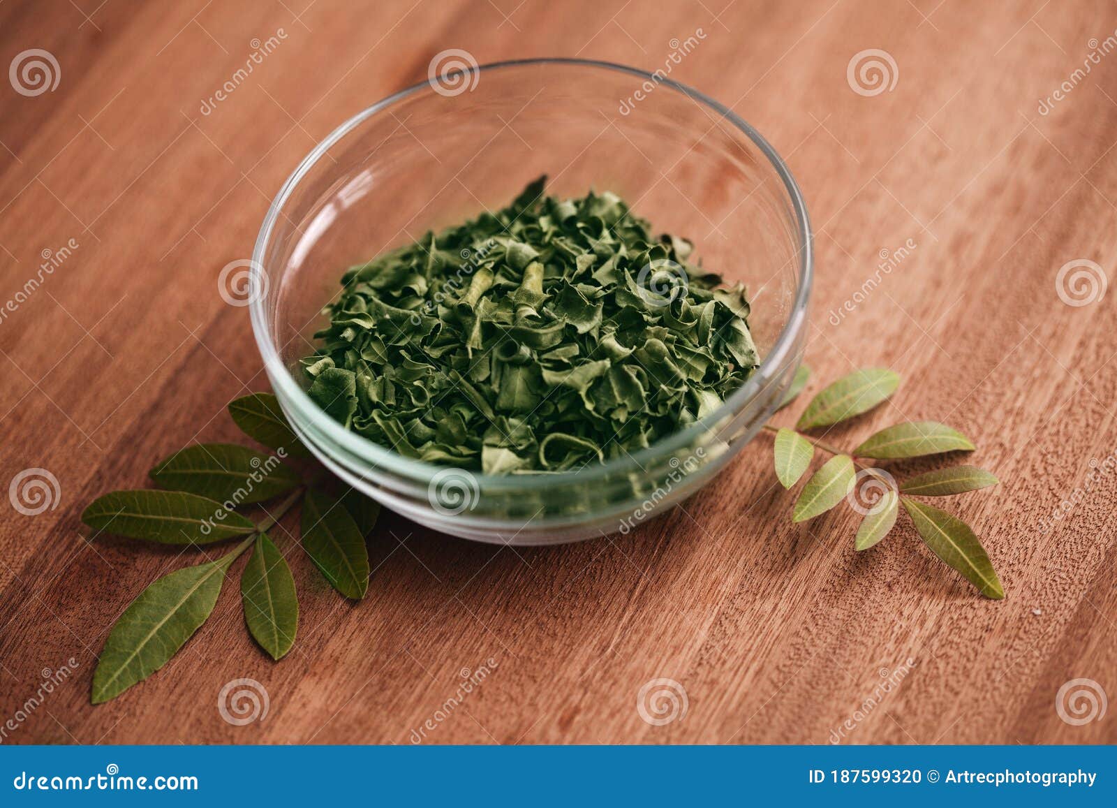 Moringa Leaf Powder in Glass Jar on Wooden Background Stock Photo ...