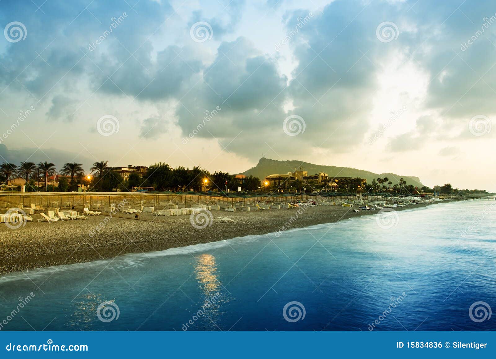 Morning beach stock photo. Image of sunbeds, tourism - 15834836