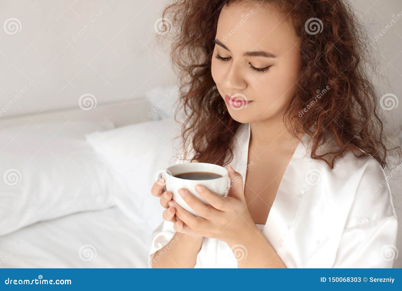 Morning Of Beautiful African American Woman Drinking Coffee At Home