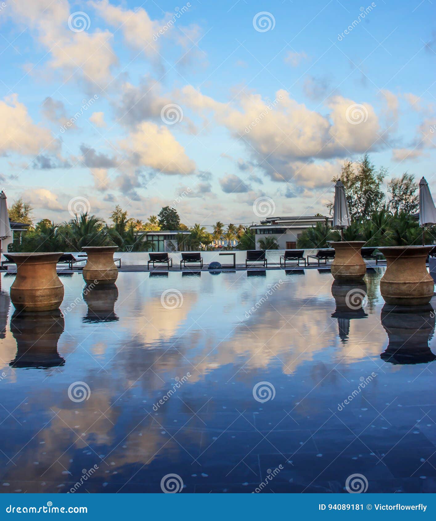 Morning Blue Sky Reflection in Swimming Pool on Tropical Beach Stock ...