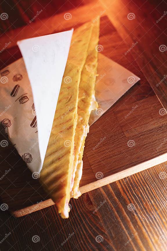 Thin Pancakes with Ham and Cheese in an Envelope are Placed on a ...