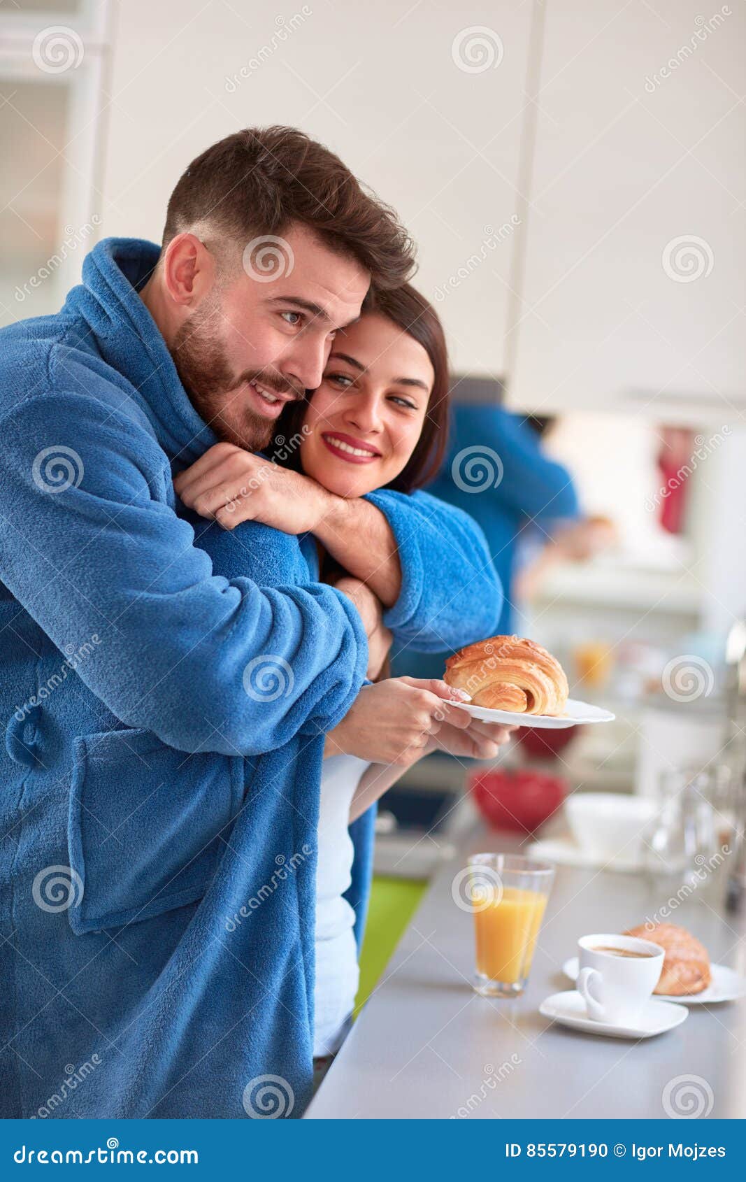 Morning hug in the kitchen stock photo. Image of inside - 85579190