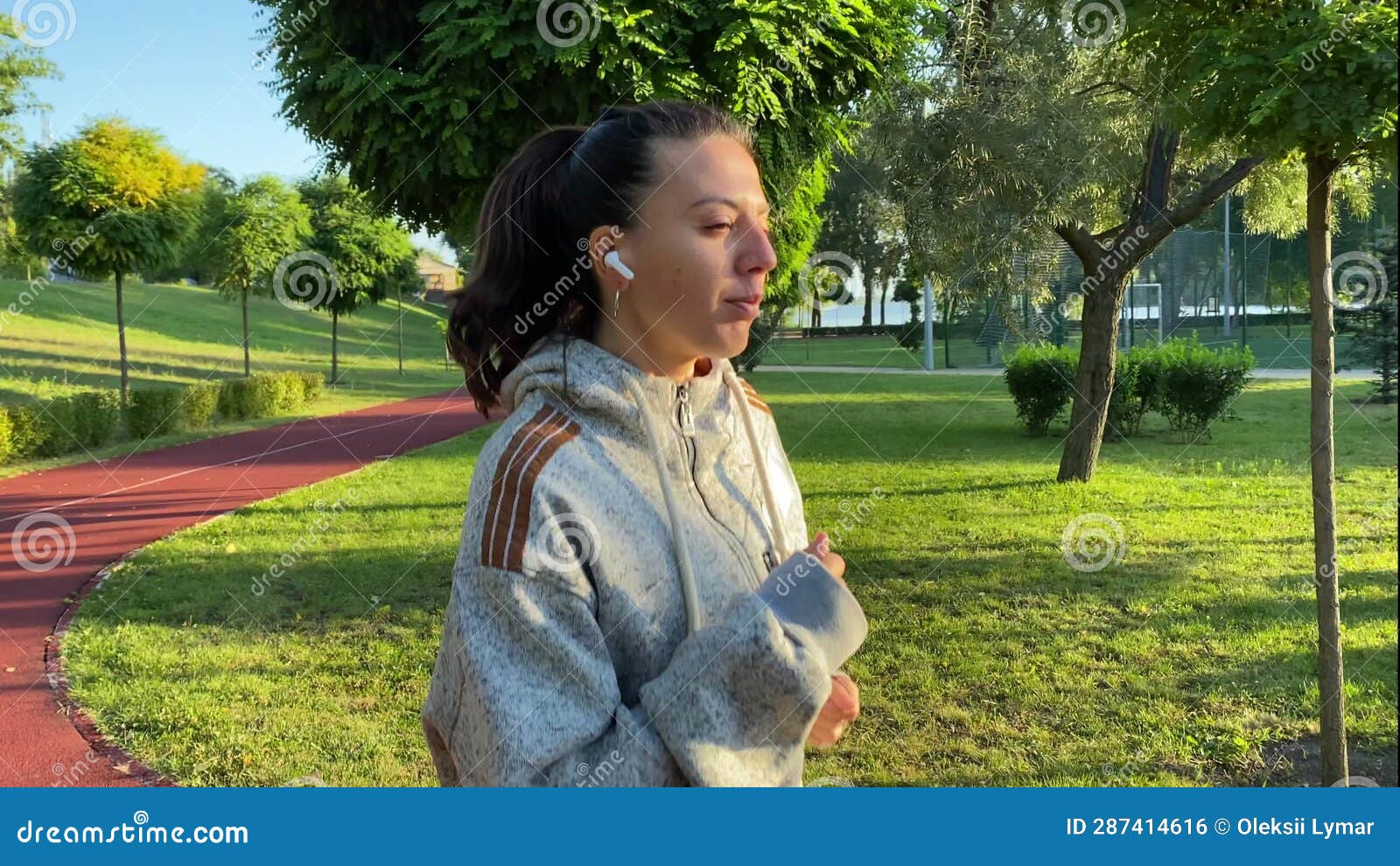 Morning Jogging with Using Wireless Technology Stock Footage - Video of ...