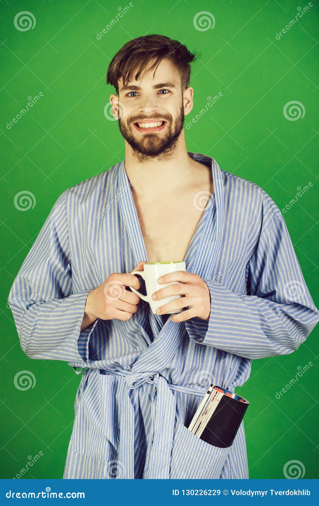 Morning Of Man Smiling In Blue Robe With Cup In Hand Stock Image