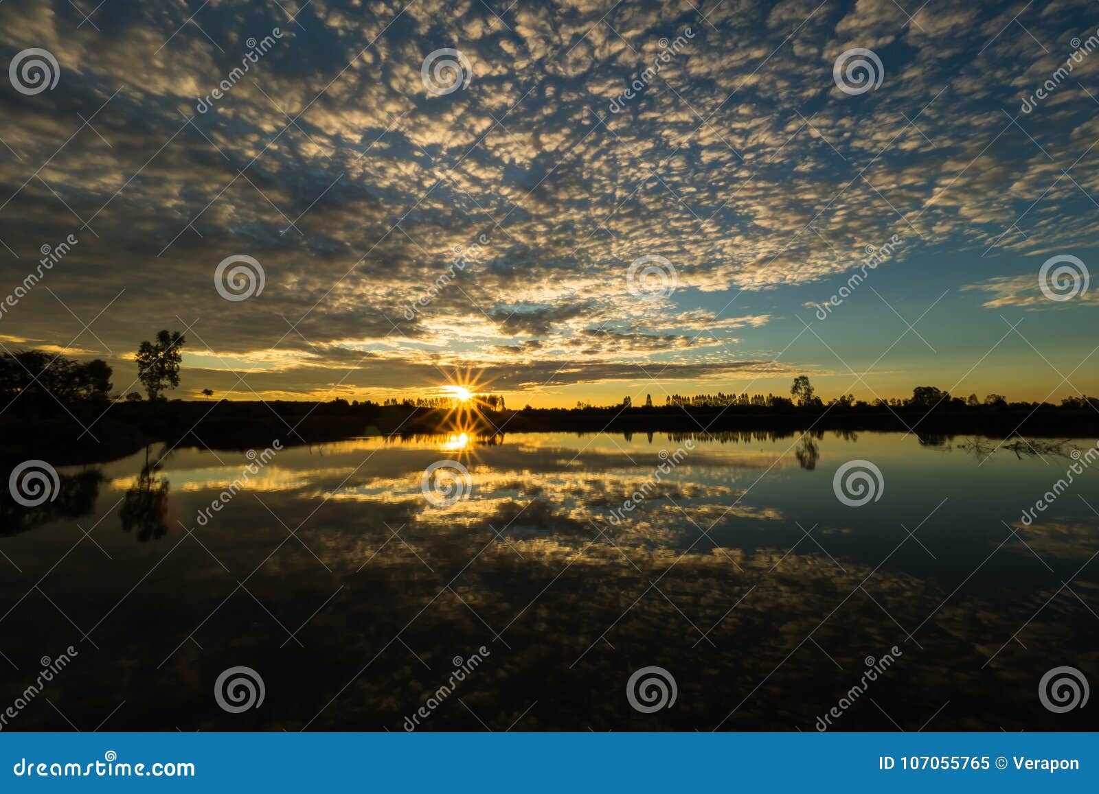 Morning Scenery with Clouds and Sky Reflecting Surface. Stock Image ...