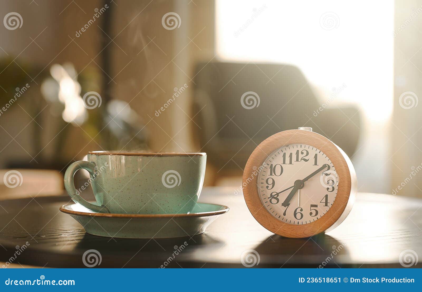 Clock and a cup of tea stock image. Image of sunlight - 236518651