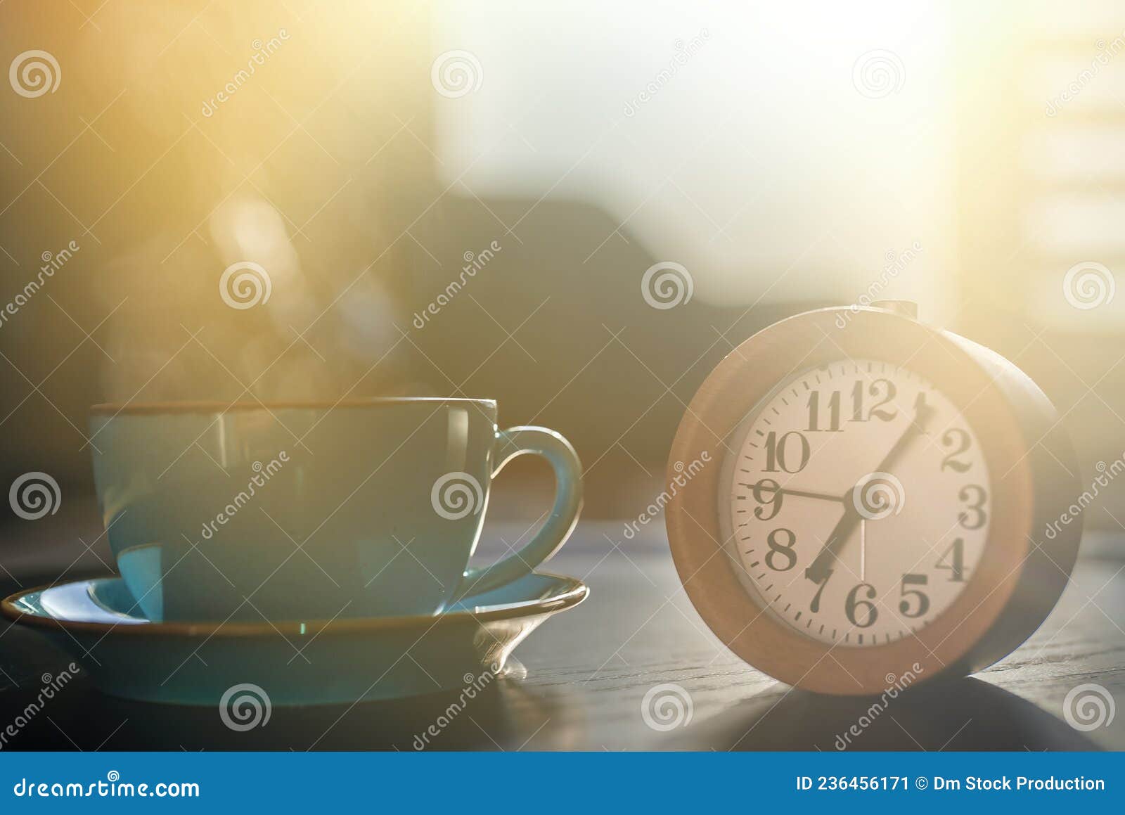 Clock and a cup of tea stock image. Image of scandinavian - 236456171