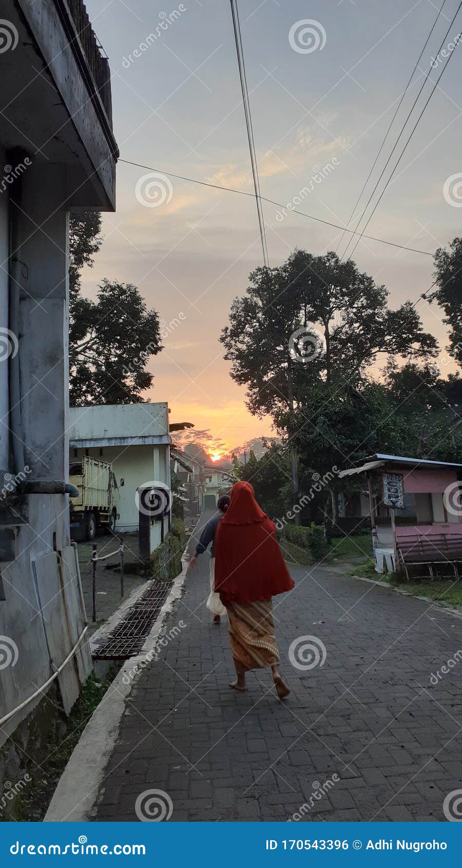 Morning sun and folks stock photo. Image of street, person - 170543396