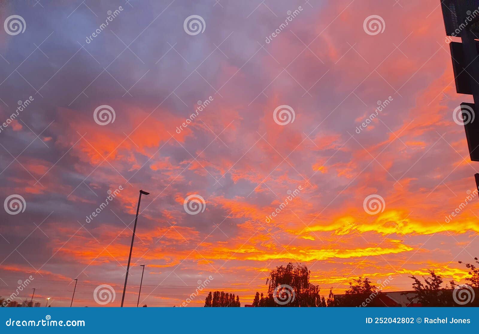 Hellish sky stock photo. Image of cumulus, plain, sunset - 252042802