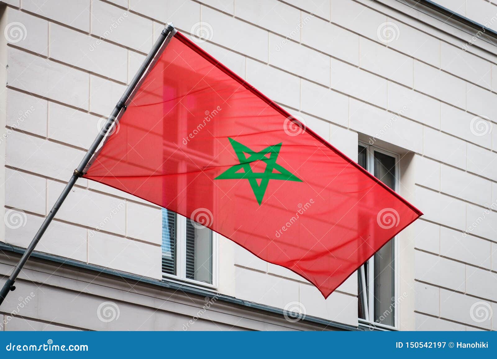 Moroccan Flag on Pole on Building - Morocco Flag Stock Image - Image of ...